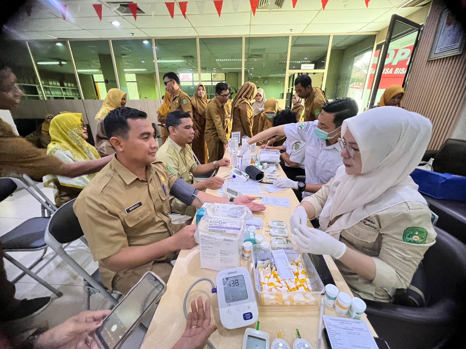 DPMD Kukar bekerja sama dengan UPTD Puskesmas Rapak Mahang melaksanakan ...